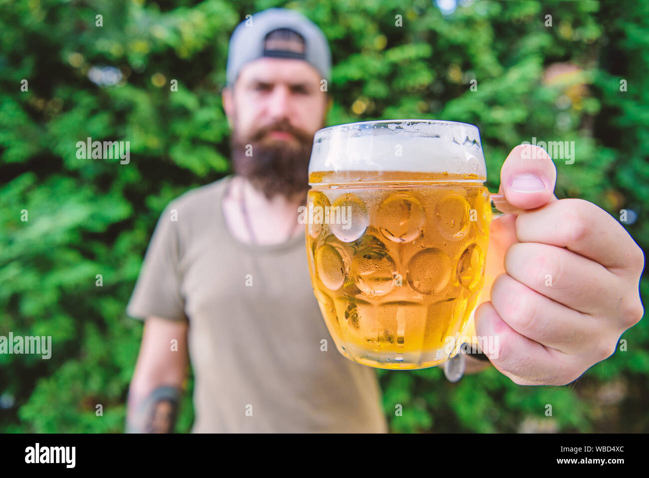 Creative young brewer. Distinct beer culture. Hipster brutal bearded ...