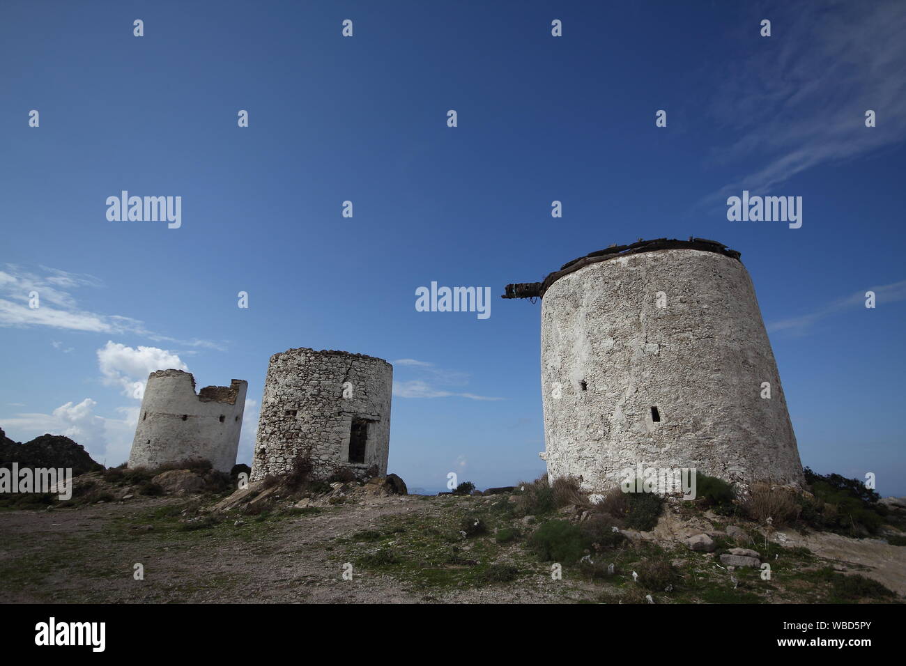 A wide angle shot from the base of an abandoned windmill Stock Photo ...
