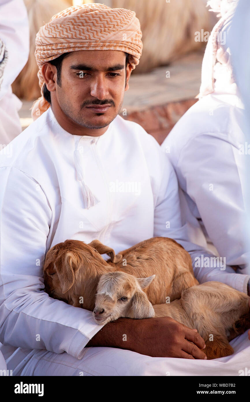 Man holding goat hi-res stock photography and images - Alamy