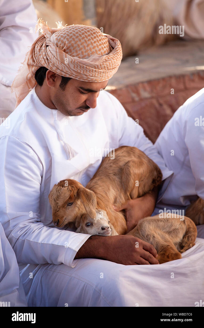 Man holding goat hi-res stock photography and images - Alamy