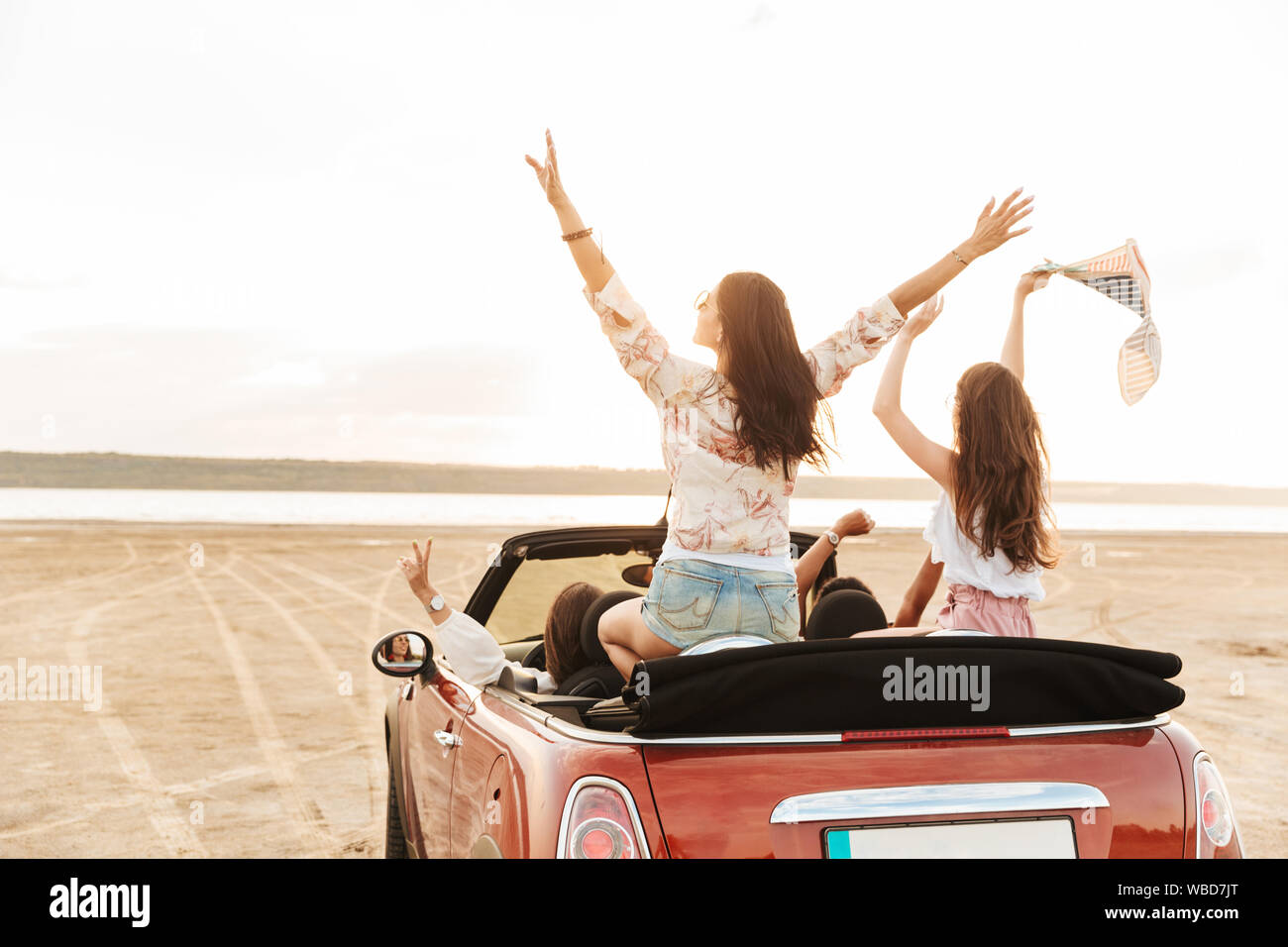 Back view picture of a beautiful pretty young pretty women friends ...