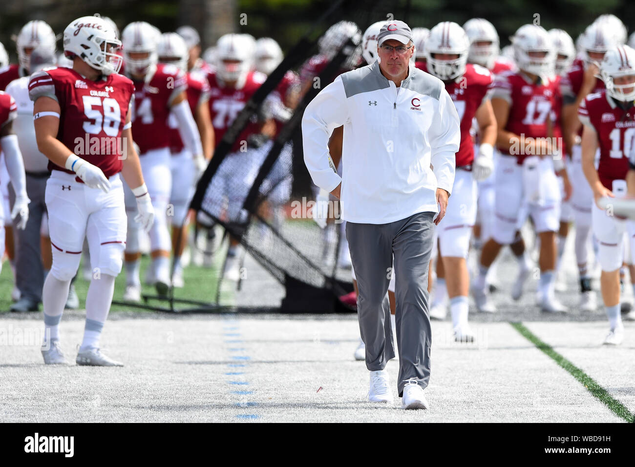 August 24, 2019: Colgate Raiders head coach Dan Hunt walks on the ...