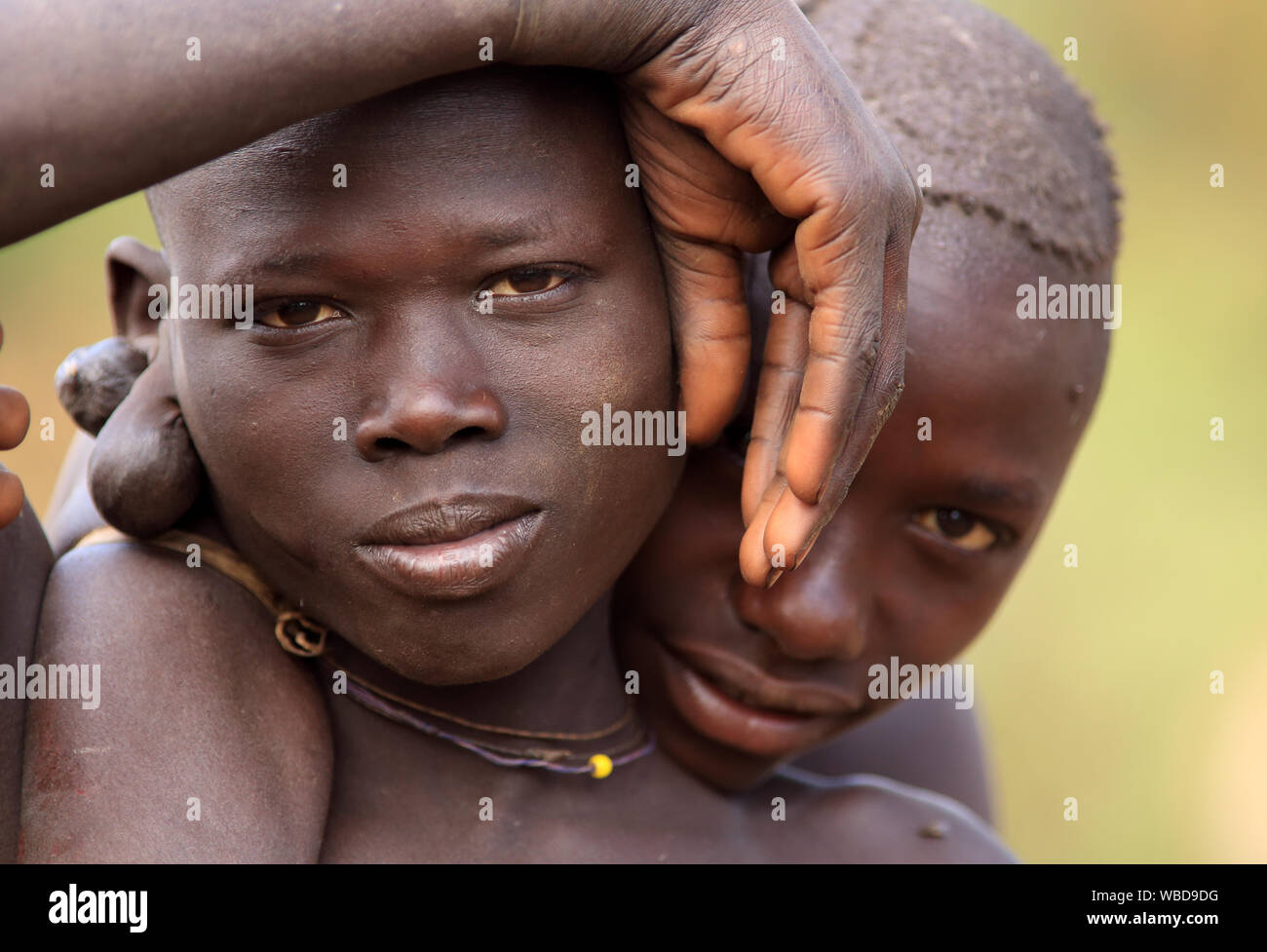 Young tribal Suri boy at a ceremony in Lower Omo Valley near Kibish ...