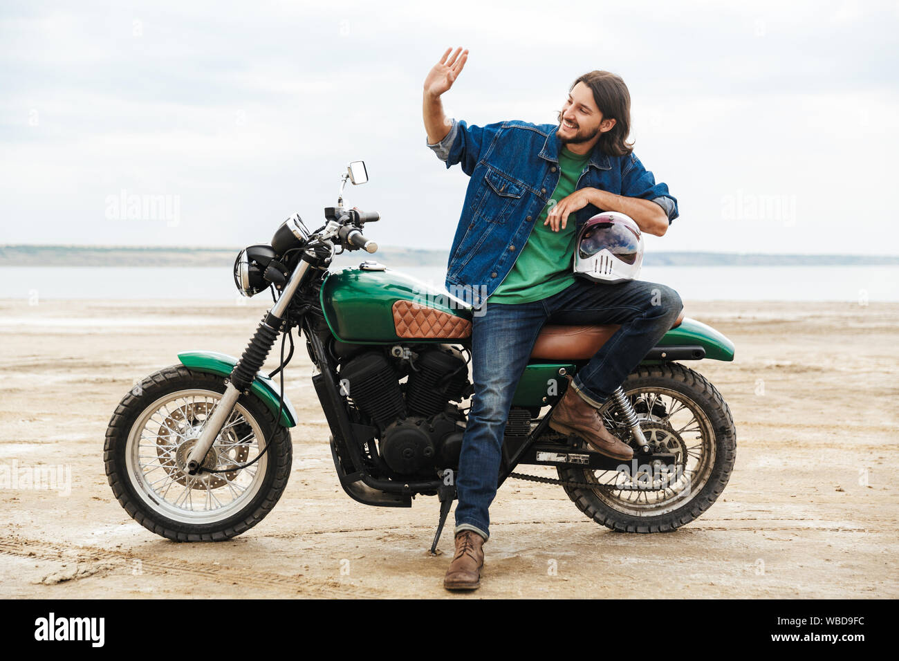 Waving biker hi-res stock photography and images - Alamy