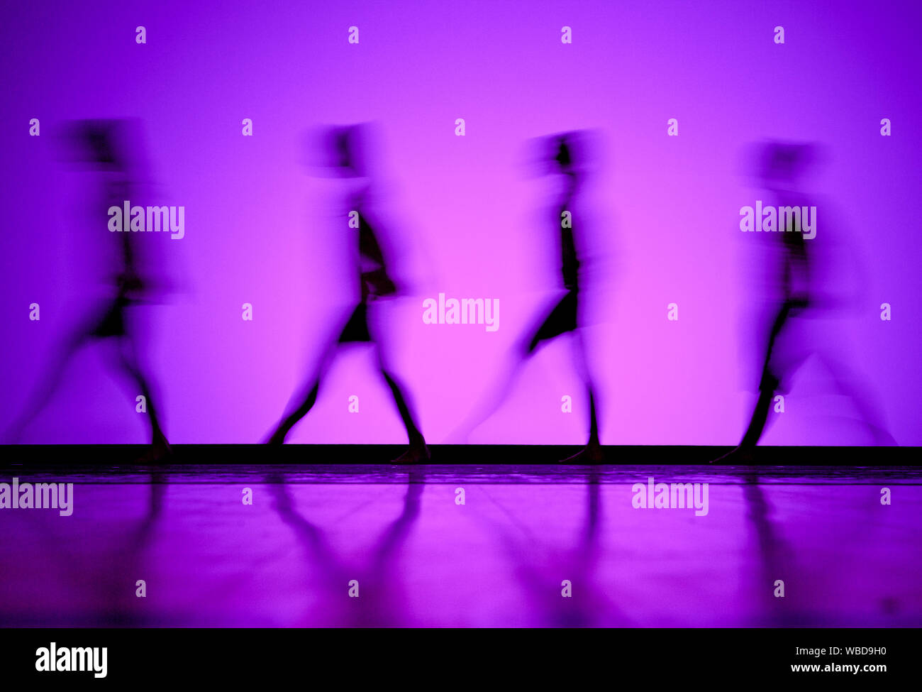 Walking across room hi-res stock photography and images - Alamy