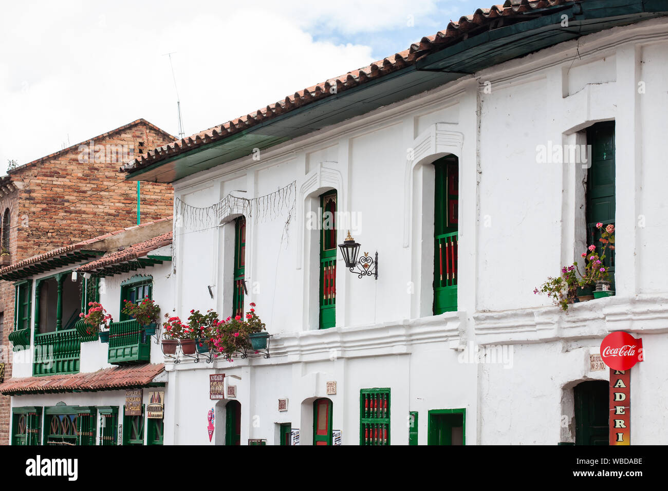 MONGUI, COLOMBIA - AUGUST, 2019: Beautiful facade of the houses at the ...