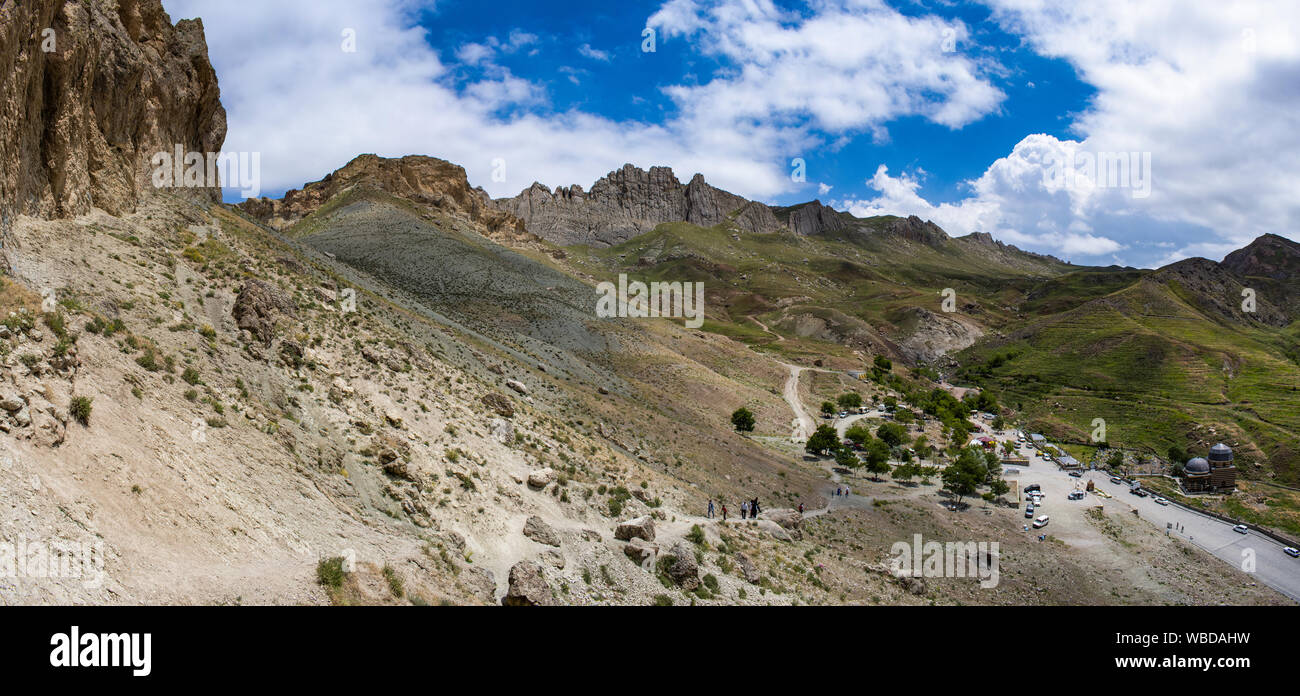 Turkey: the road up to the rocky mountains with a little mosque located ...
