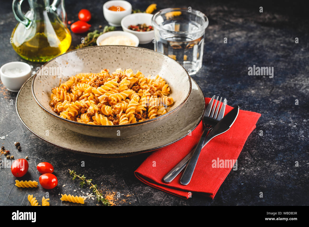 Pasta fusilli with bolognese tomato beef sauce. Traditional italian ...