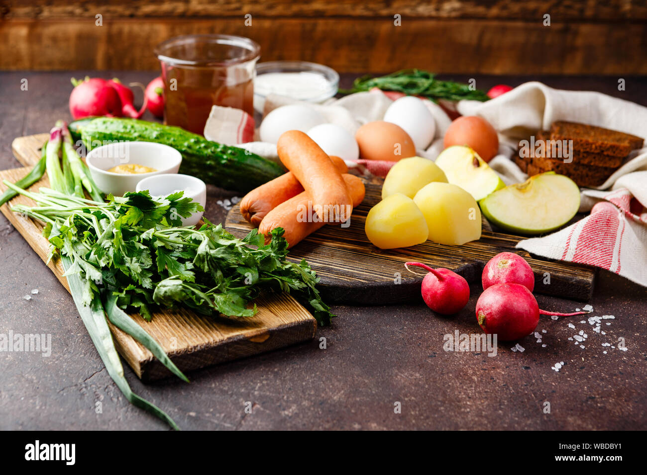 Set of ingredients for preparing traditional Russian cold soup Okroshka ...