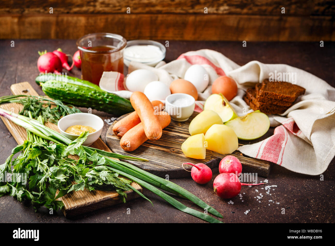 Set of ingredients for preparing traditional Russian cold soup Okroshka ...