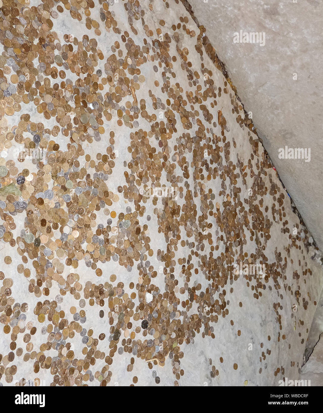 Throwing gold coins hi-res stock photography and images - Alamy