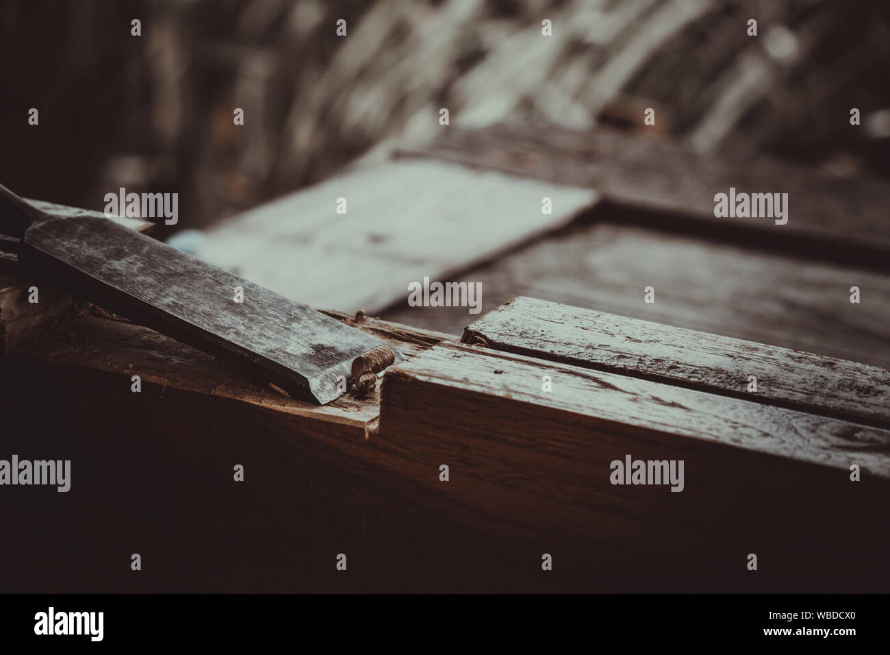 Close up the chisel to sharpen the wood plank Stock Photo - Alamy