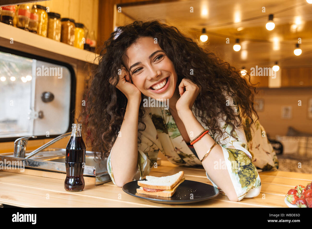 Woman standing inside hi-res stock photography and images - Alamy