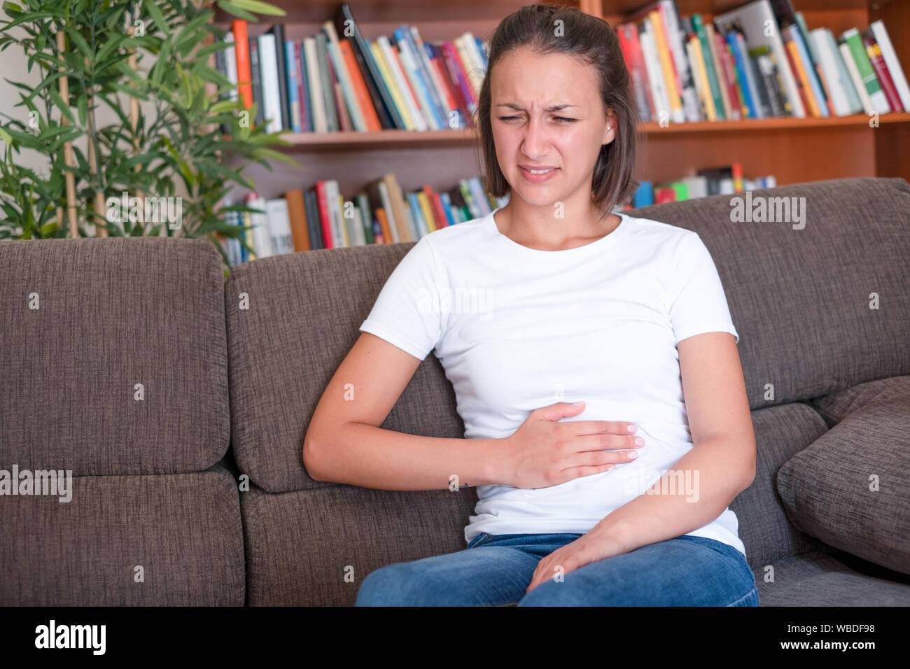 Period pain woman hi-res stock photography and images - Alamy