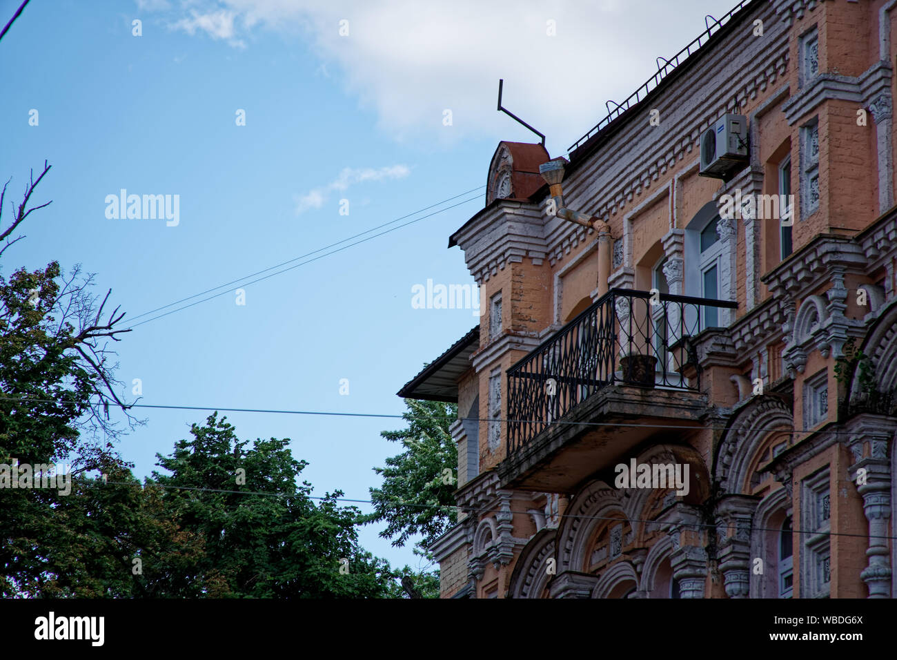Angle of antique building with balcony. Architecture large building of ...
