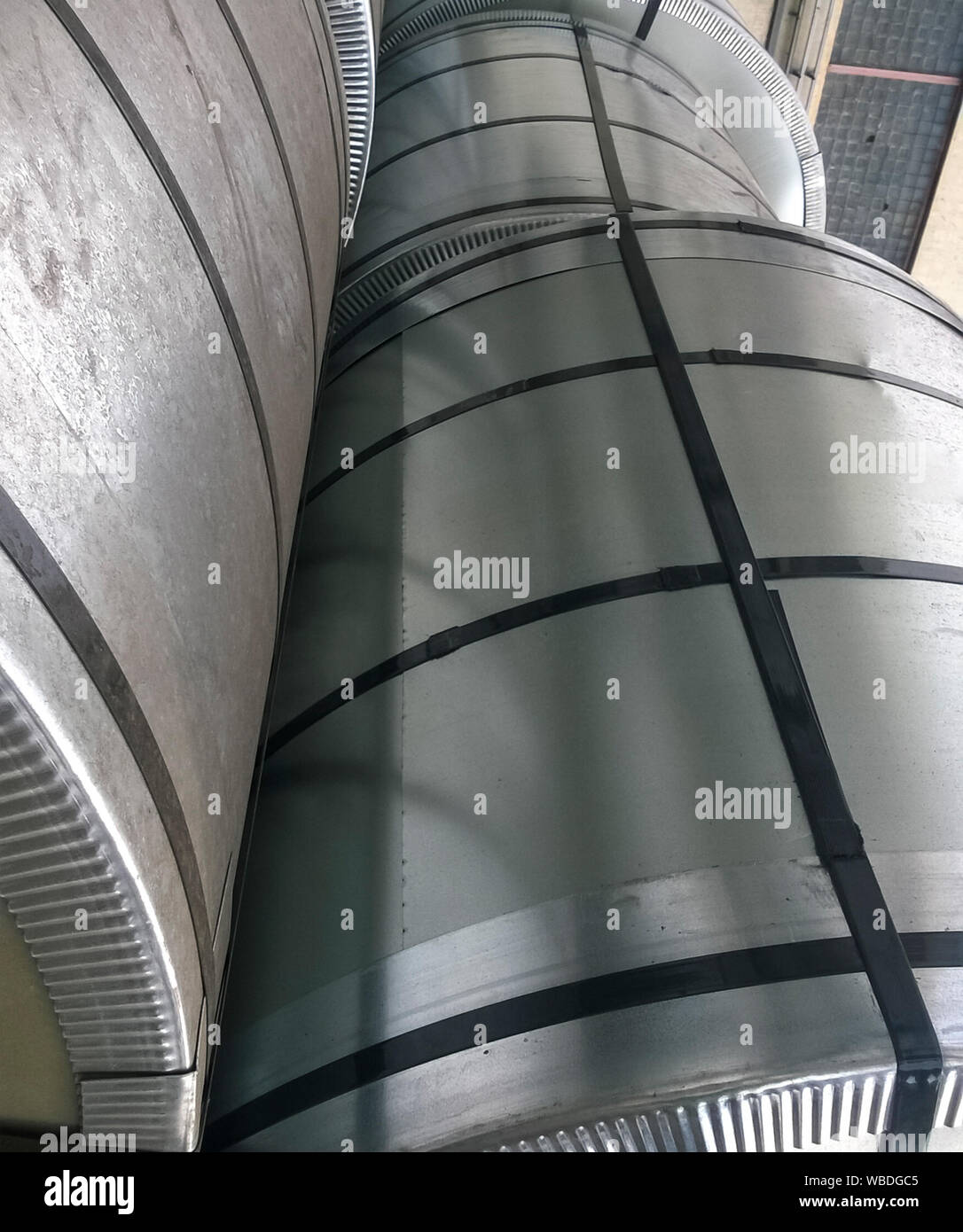 Steel sheets rolled up into rolls. Export Steel. Packing of steel for ...