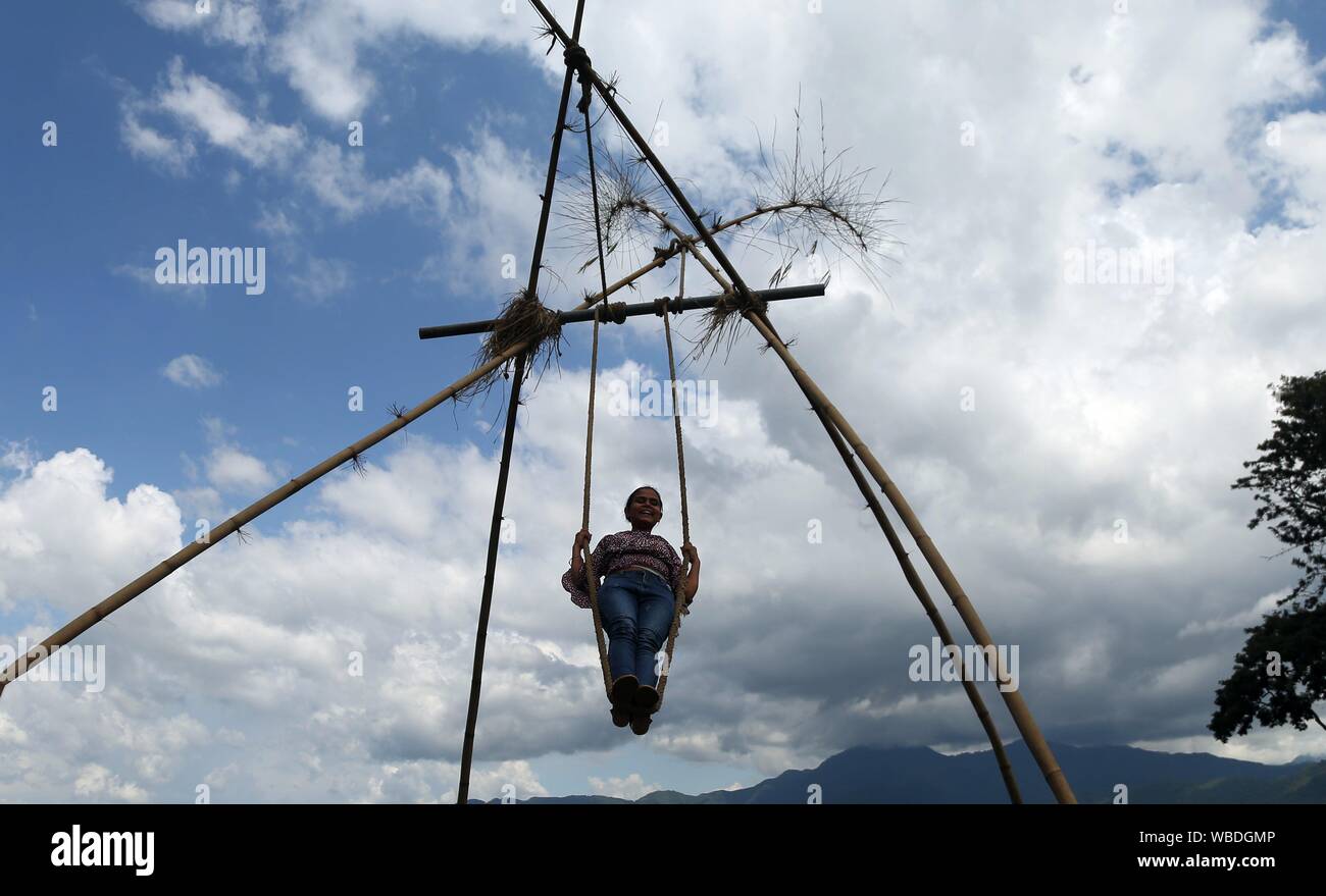 Kathmandu, Nepal. 26th Aug, 2019. A Nepalese girl plays in a ...