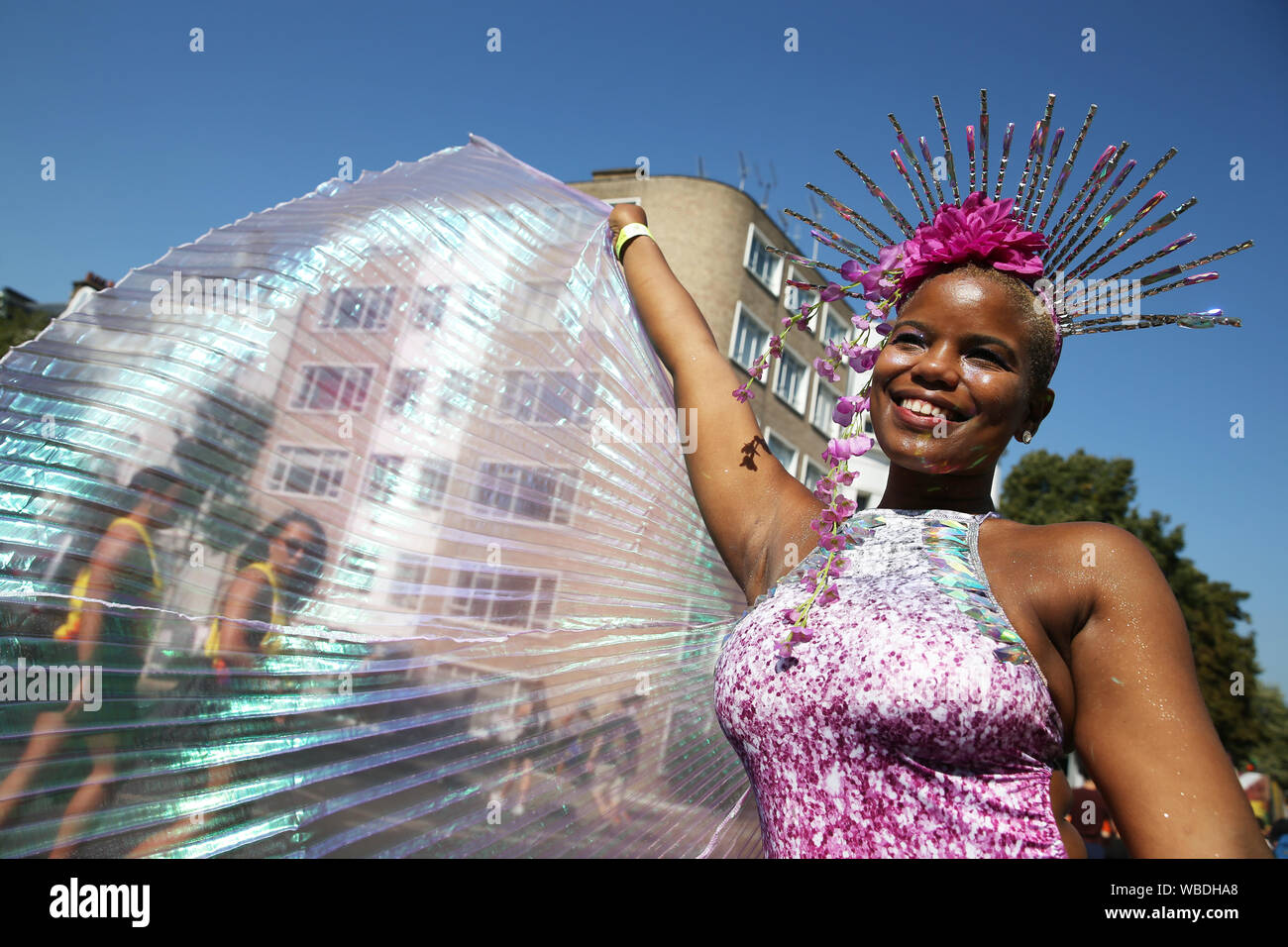 A dancer performs during the the Notting Hill Carnival in west London ...