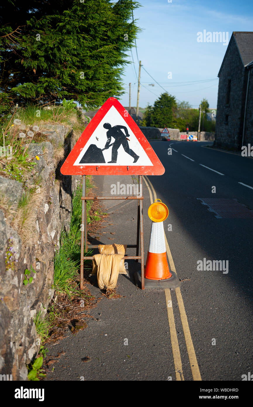 Road work signs in UK village Stock Photo - Alamy