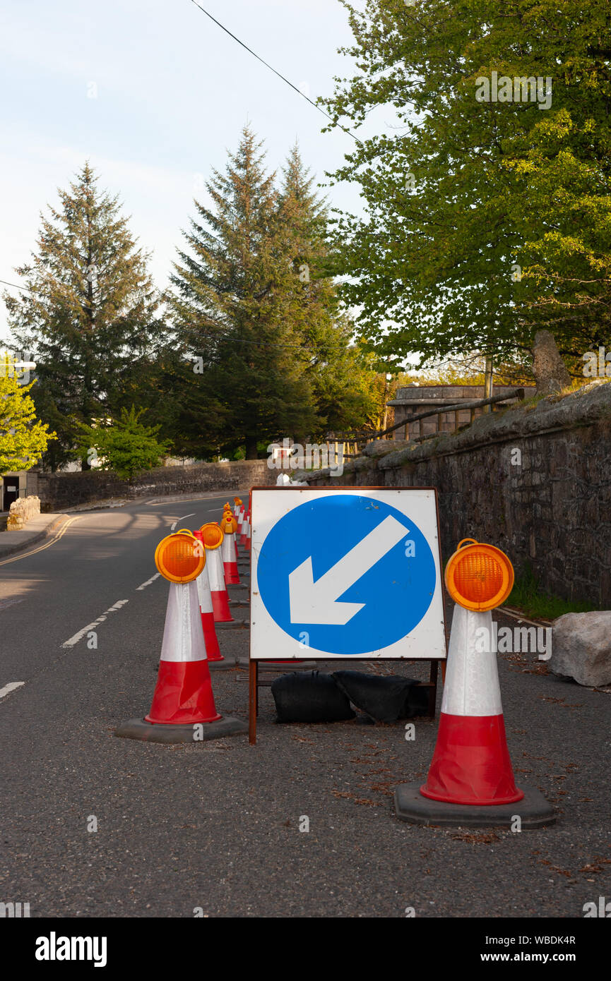 Road work signs in UK village Stock Photo - Alamy