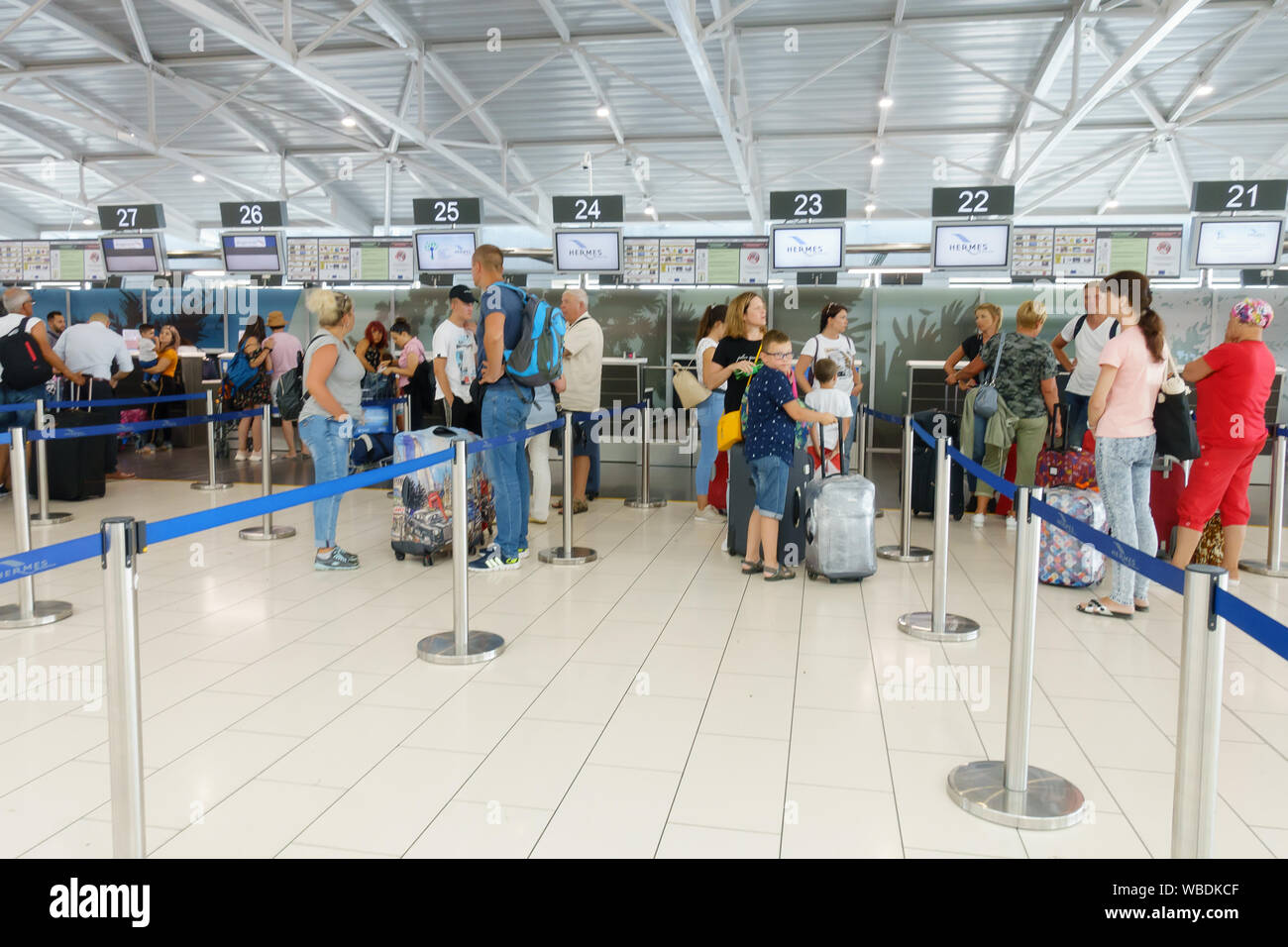 Larnaca, Cyprus - July 30. 2019: Passengers pass passport control in ...