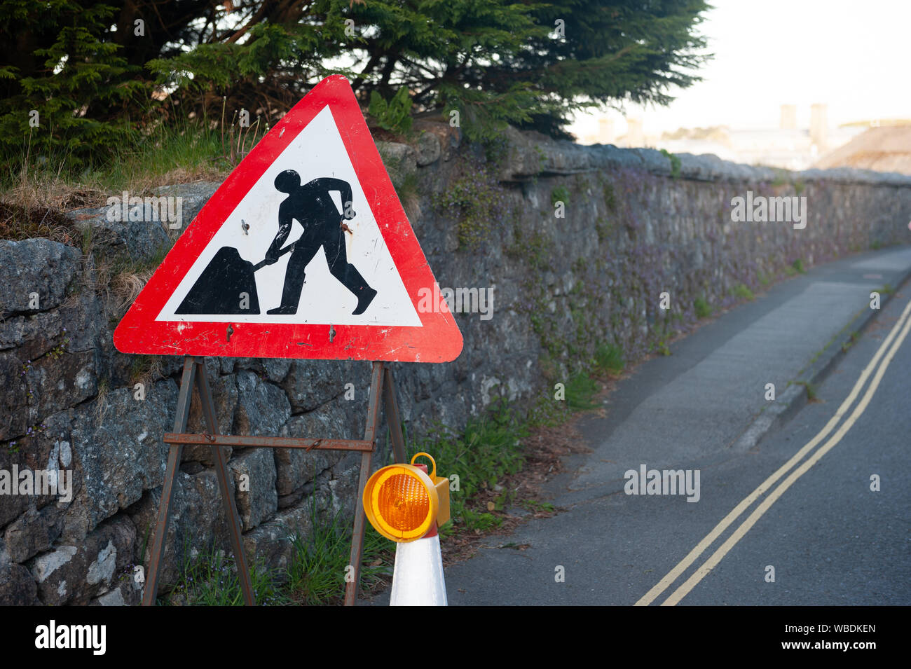 Road work signs in UK village Stock Photo - Alamy