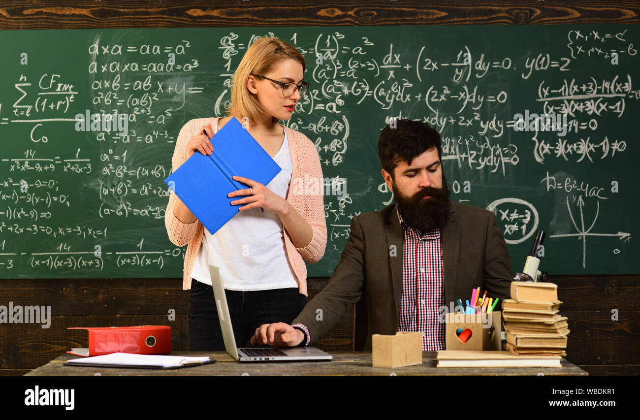 Education and literacy concept - high school teachers give lectures in ...