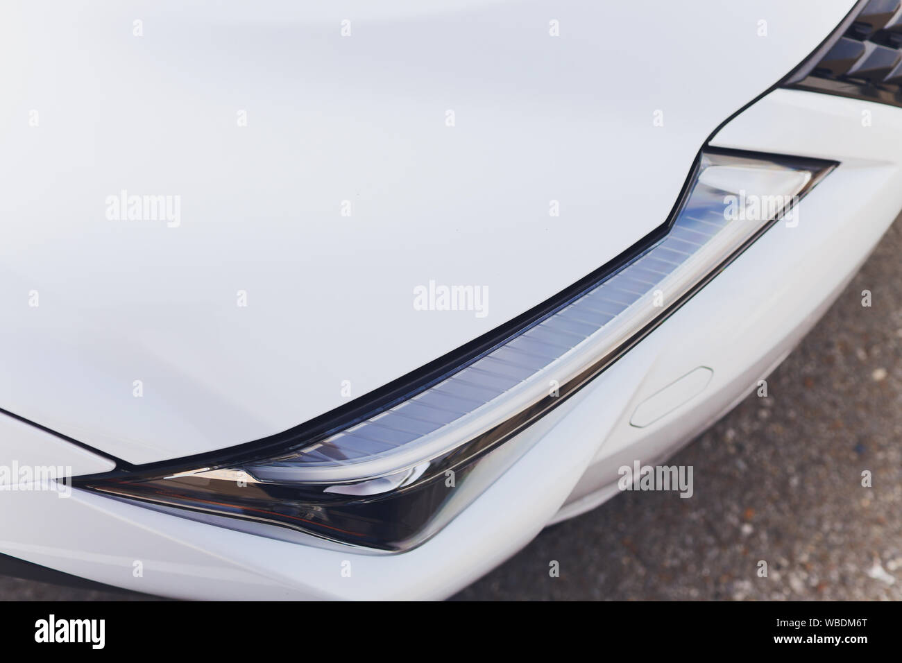 Close up detail on one of the LED headlights modern car Stock Photo - Alamy