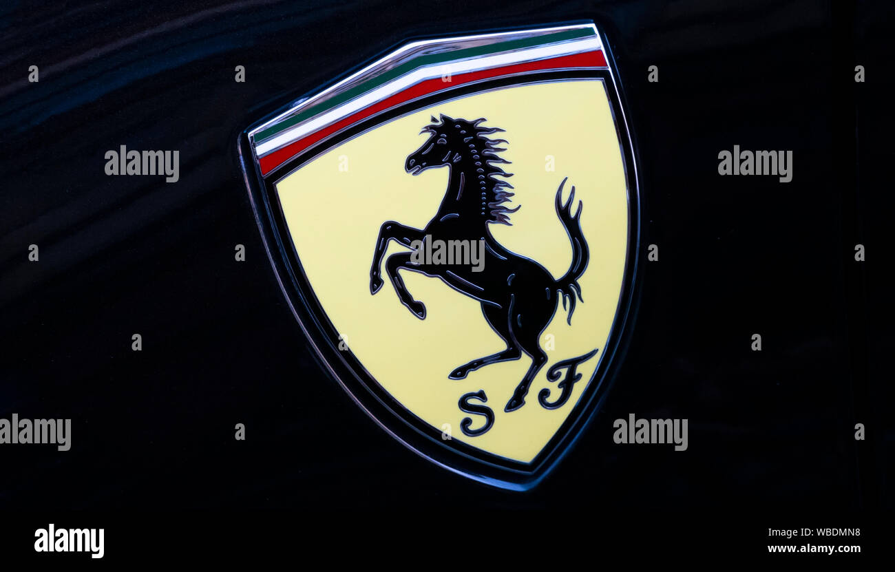 Badge logo on a Ferrari sport car Stock Photo - Alamy