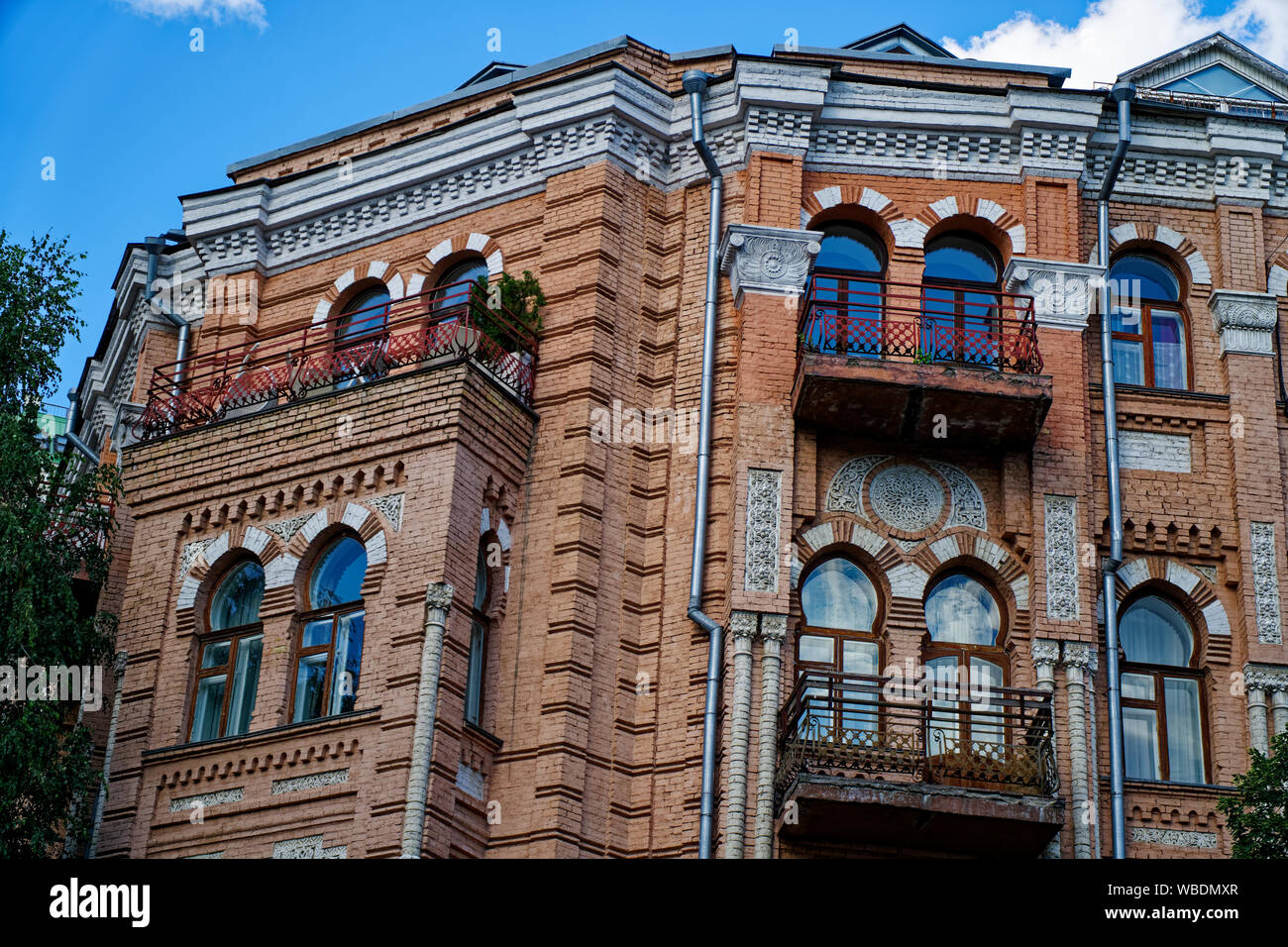 Angle of antique building with balcony. Architecture large building of ...