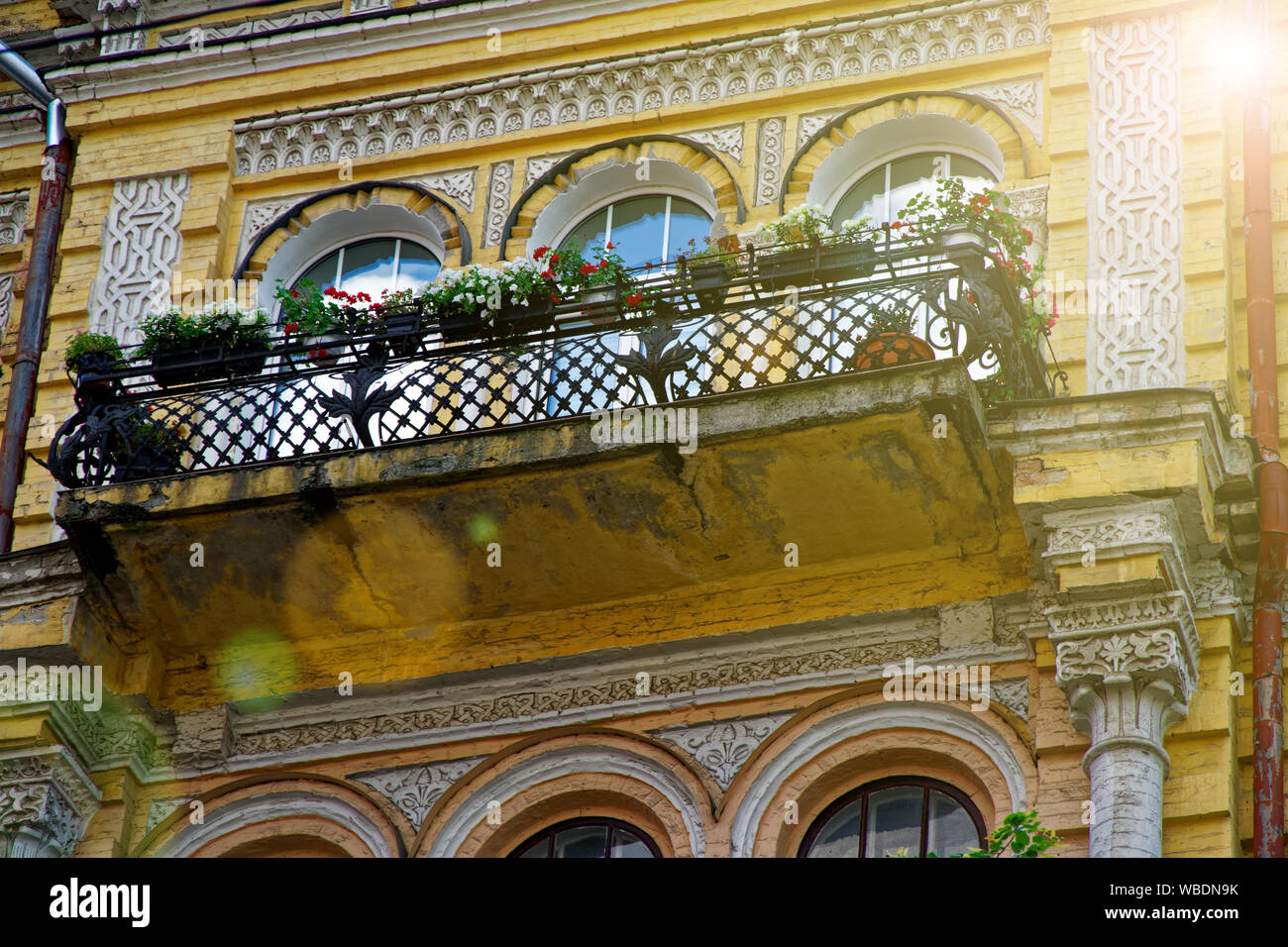 Angle of antique building with balcony. Architecture large building of ...