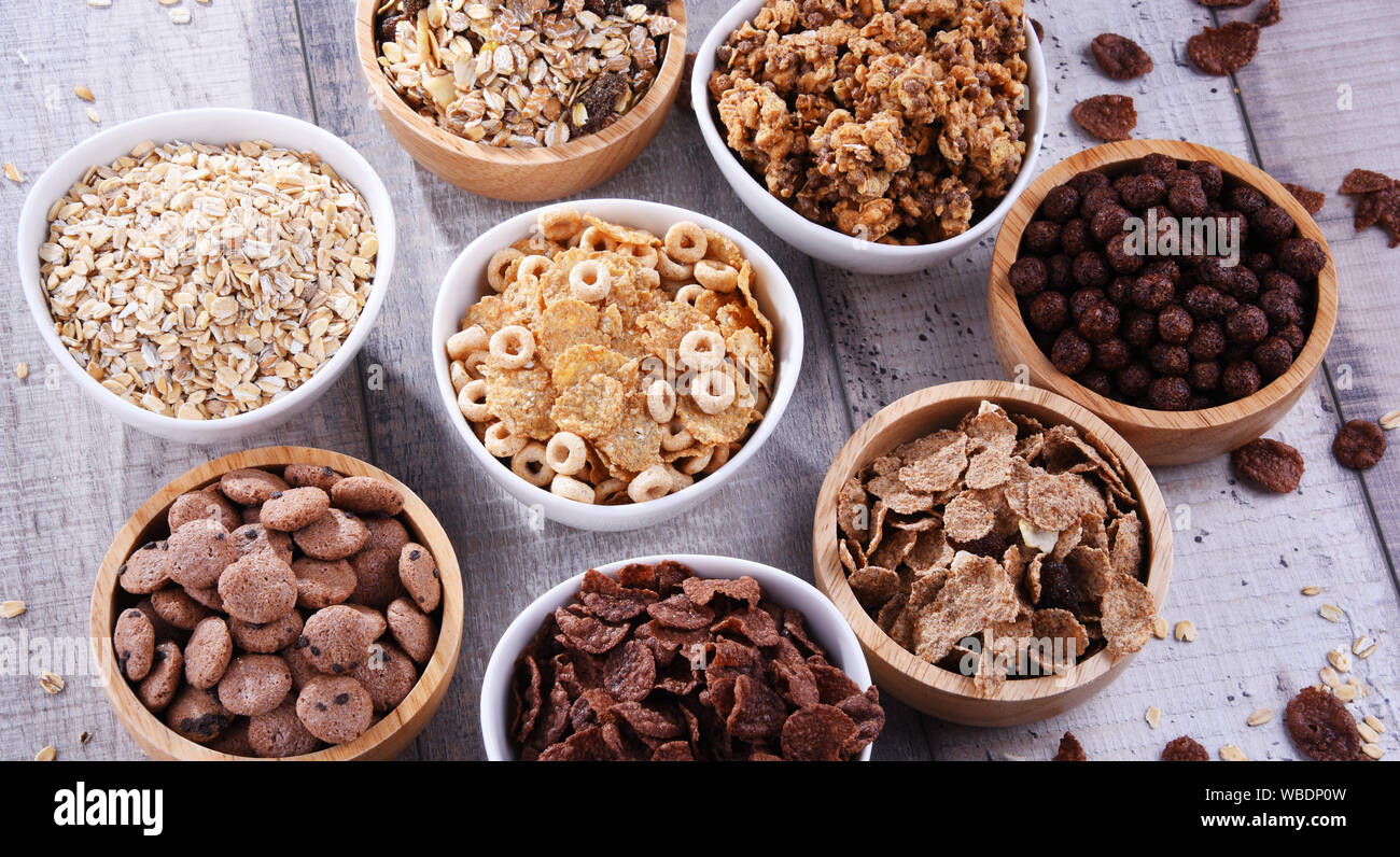 Bowls containing different sorts of breakfast cereal products Stock ...