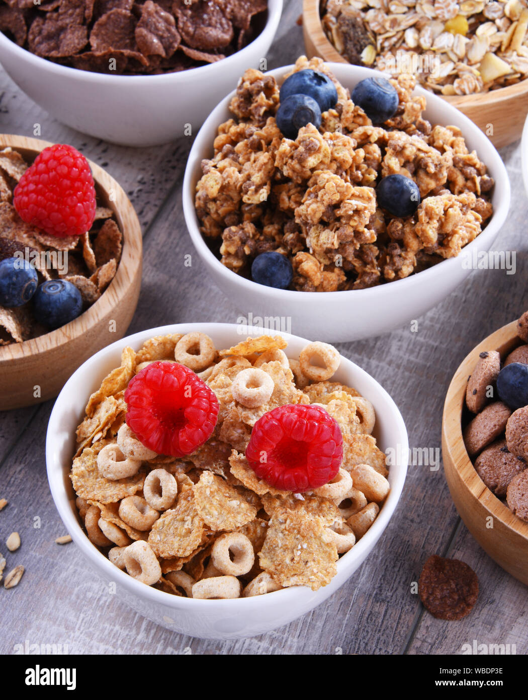 Bowls containing different sorts of breakfast cereal products Stock ...