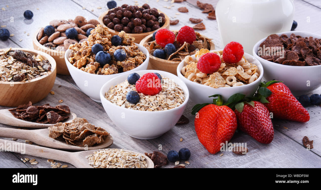 Bowls containing different sorts of breakfast cereal products Stock ...