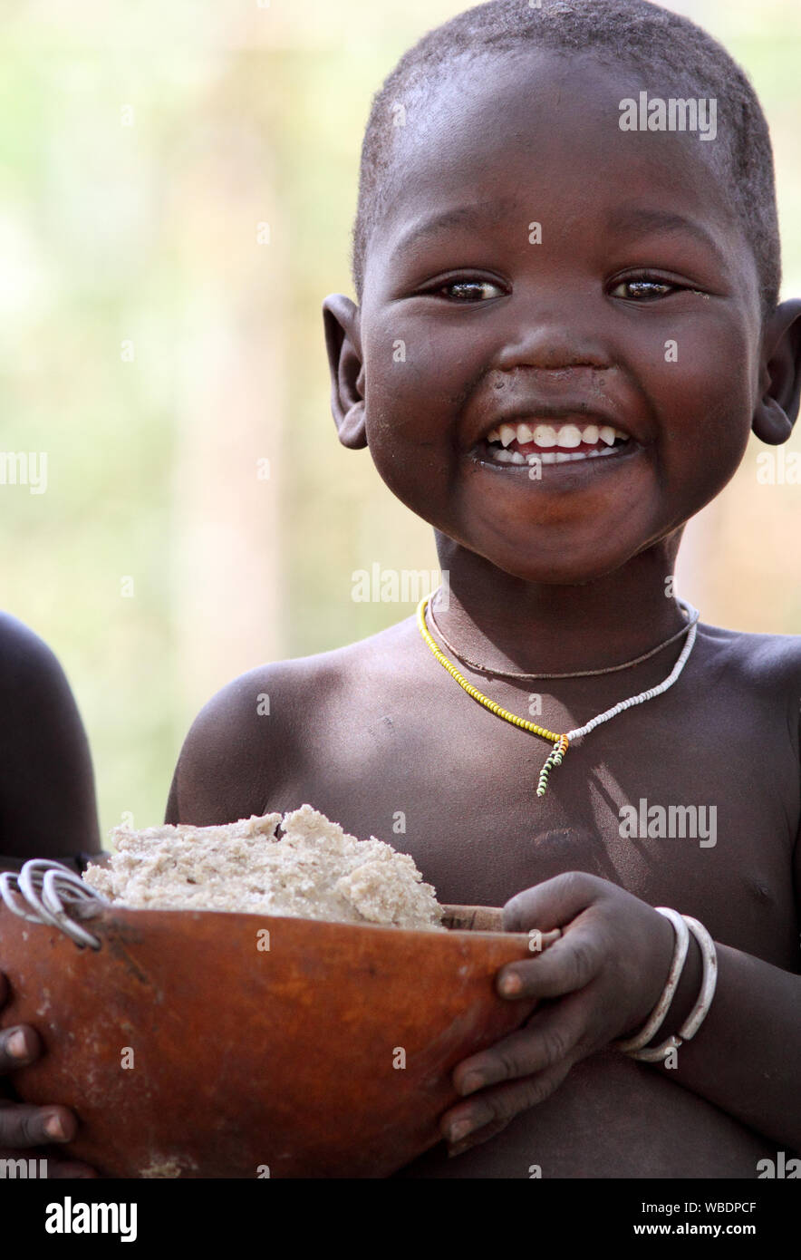 Young tribal Suri boy at a ceremony in Lower Omo Valley near Kibish ...