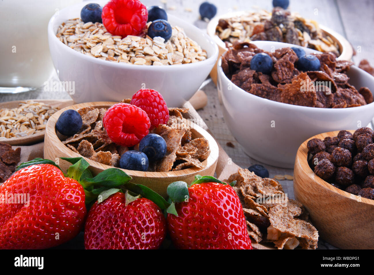 Bowls containing different sorts of breakfast cereal products Stock ...