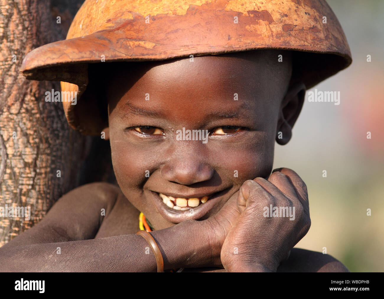 Young tribal Suri boy at a ceremony in Lower Omo Valley near Kibish ...