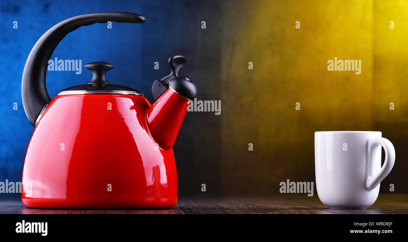 Traditional stainless steel stovetop kettle with whistle of two litres ...