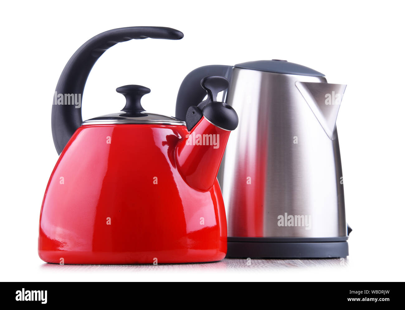 Traditional stovetop kettle with whistle and modern electric cordless ...