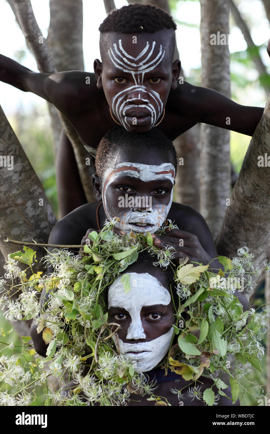 Young tribal Suri boy at a ceremony in Lower Omo Valley near Kibish ...