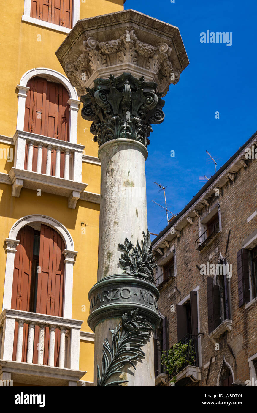 Traditional antique column on the street of Venice, Italy Stock Photo ...
