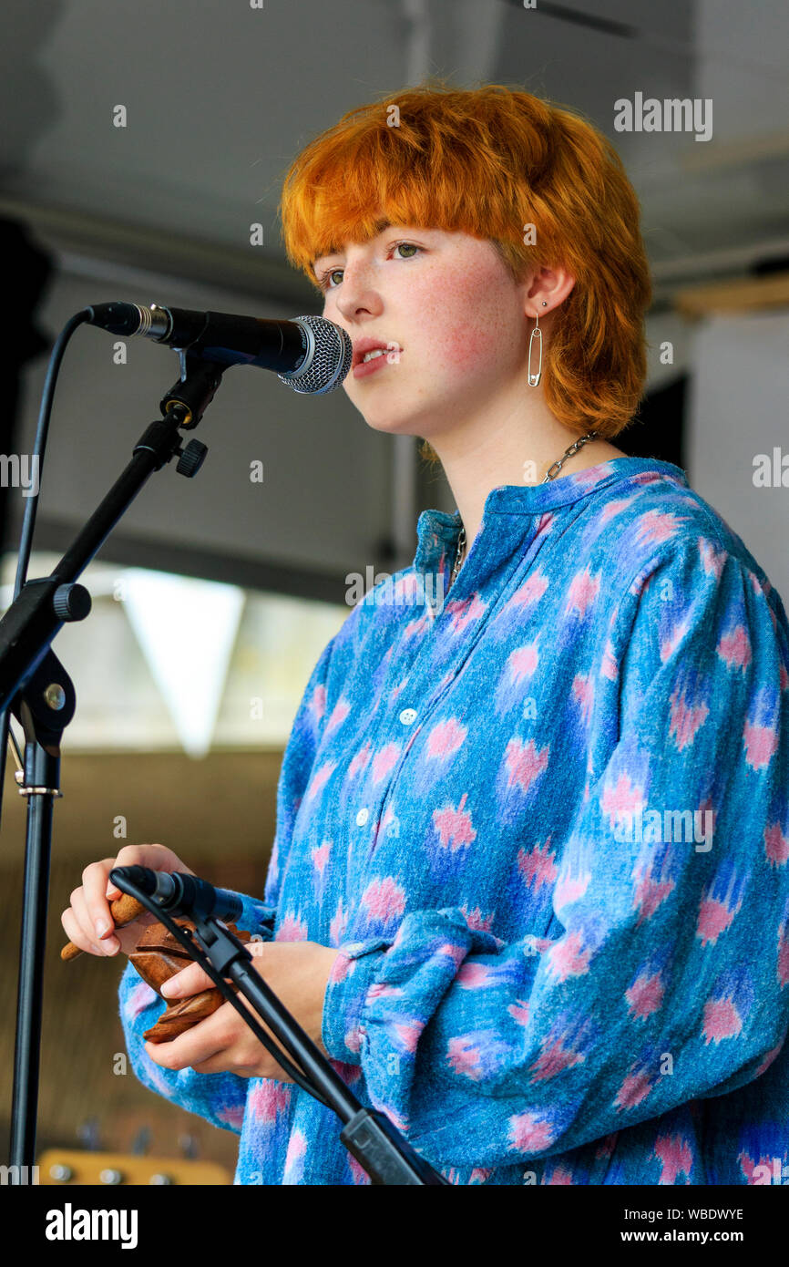 Sandwich folk and Ale Festival. Young teenage red head Caucasian women ...