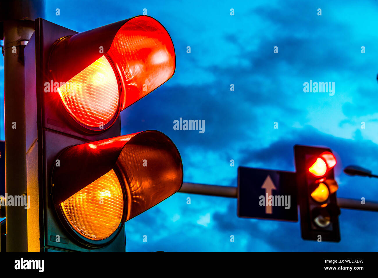 Traffic lights over urban intersection. Red light Stock Photo - Alamy