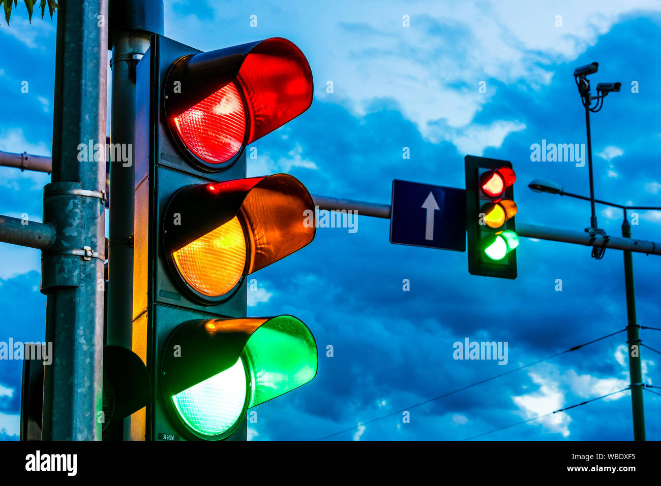 Traffic lights over urban intersection. Red light Stock Photo - Alamy