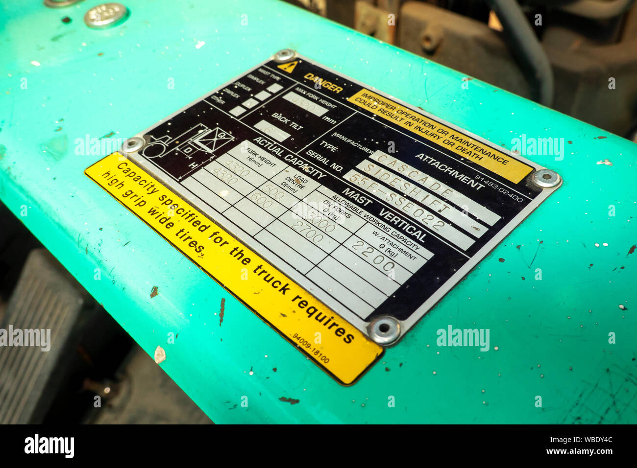 Information plate attached to a fork lift truck Stock Photo - Alamy