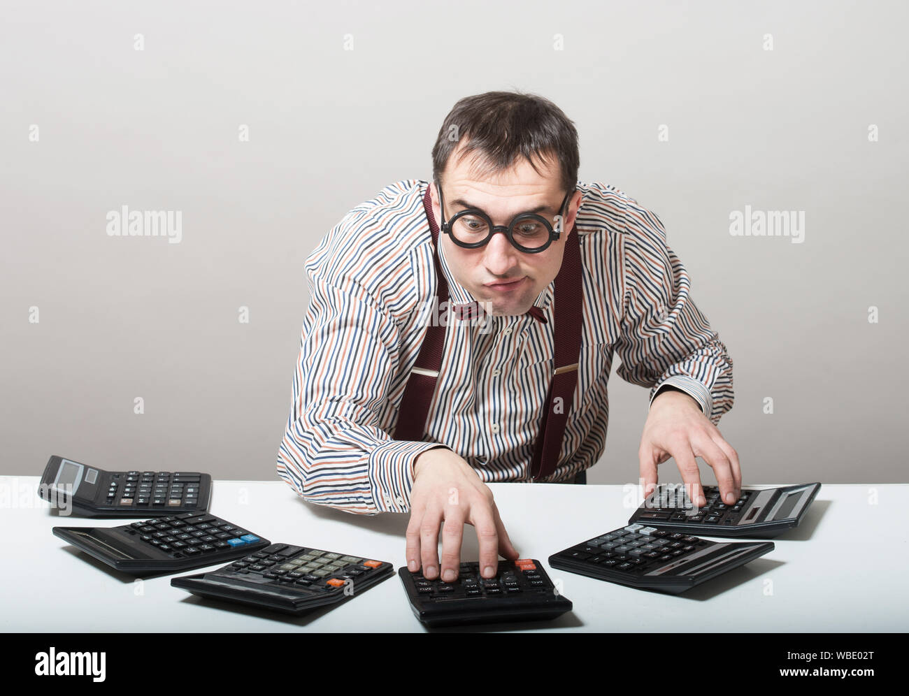 Sad accountant, humorous portrait. Studio shot Stock Photo - Alamy