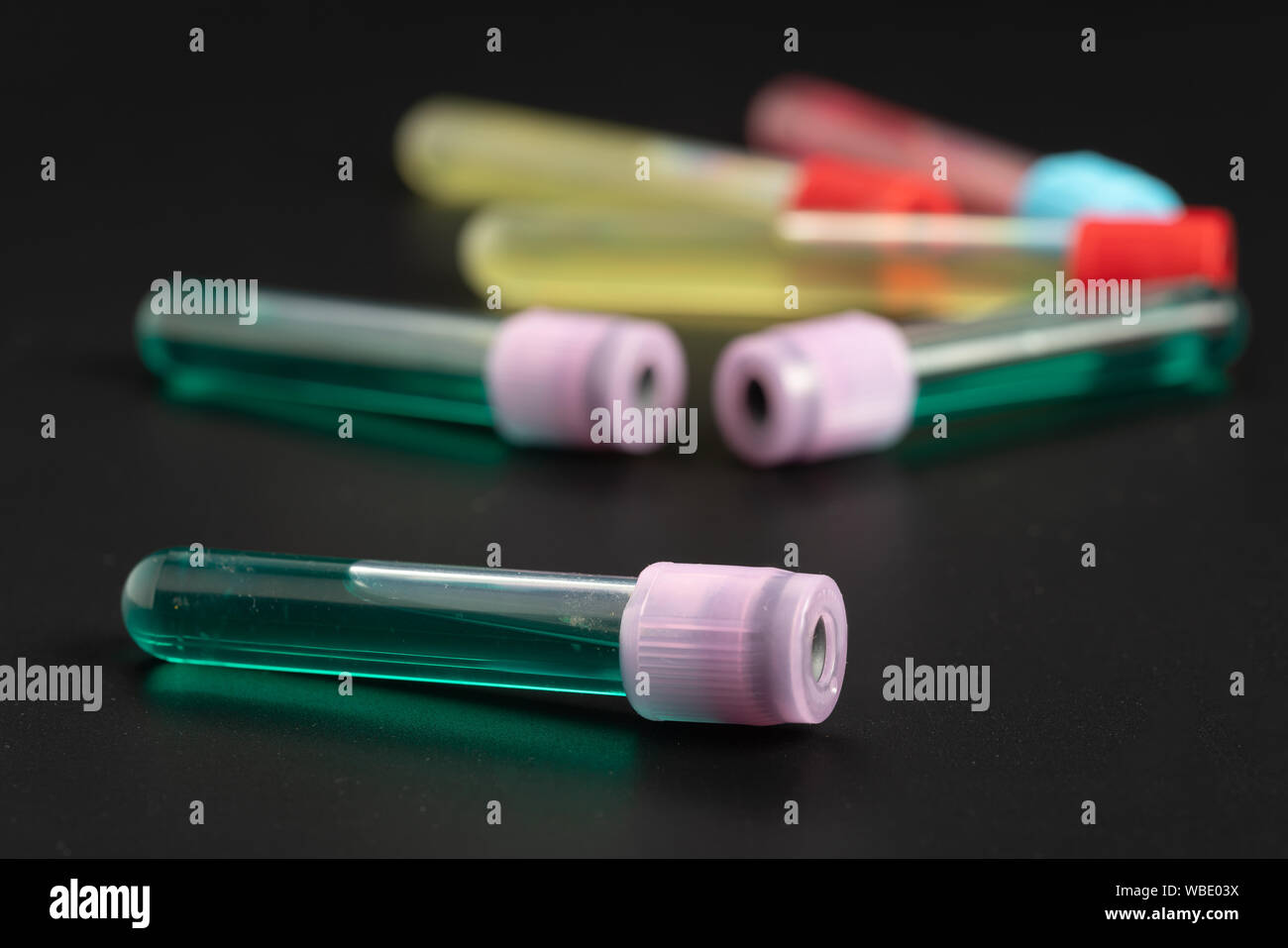 Test tubes with chemical samples in science laboratory Stock Photo - Alamy