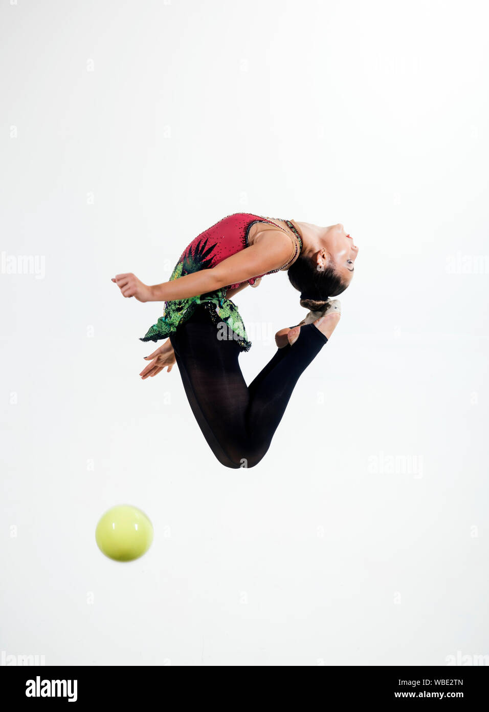 energy of jumping girl with ball isolated on white background. energy ...