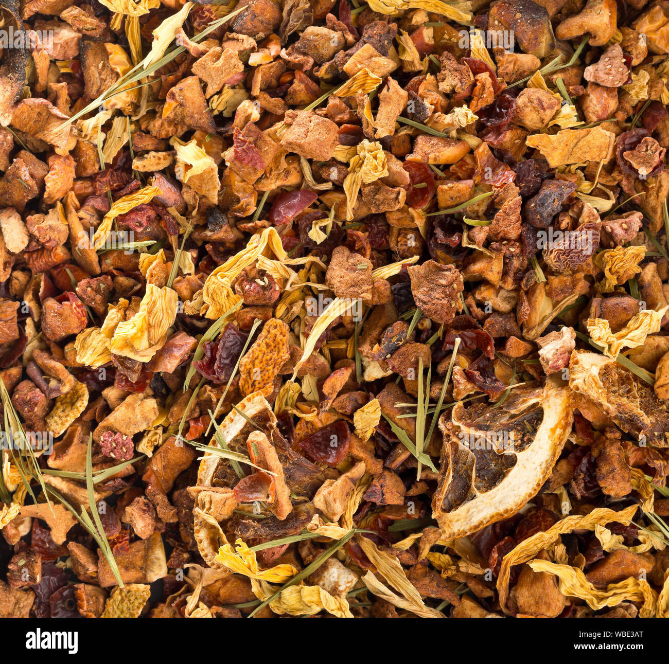 Heap of dried fruit tea infusion with oranges and strawberries mixed ...