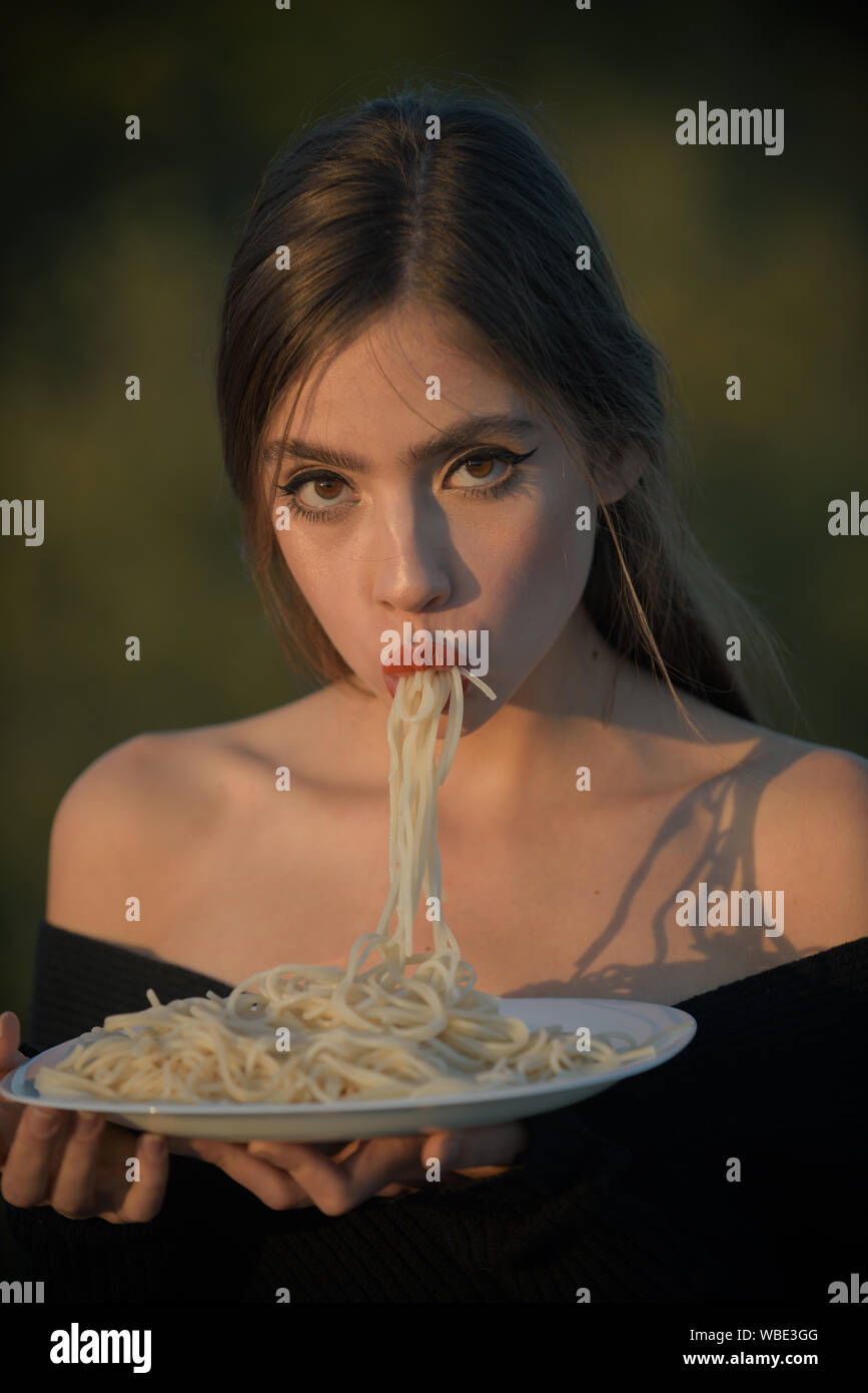 Woman eating spaghetti italy hi-res stock photography and images - Alamy